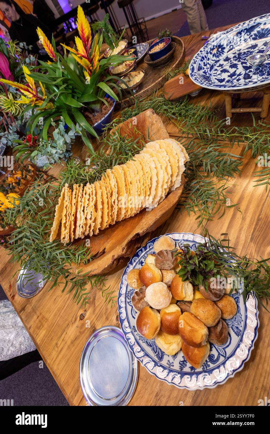Sophisticated table of assorted brazilian foods Stock Photo - Alamy
