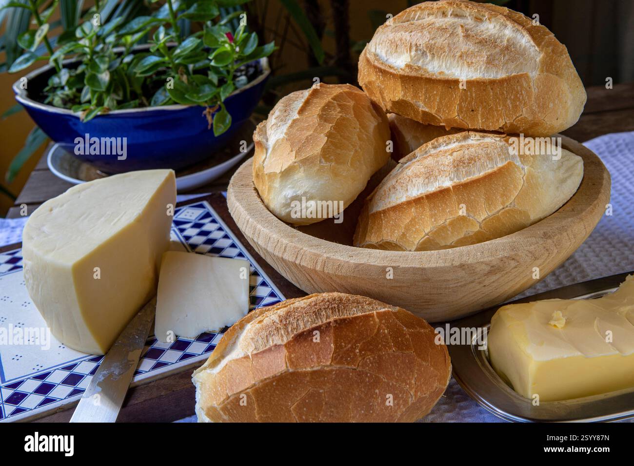 Basket of French bread, traditional Brazilian bread, with cheese and ...