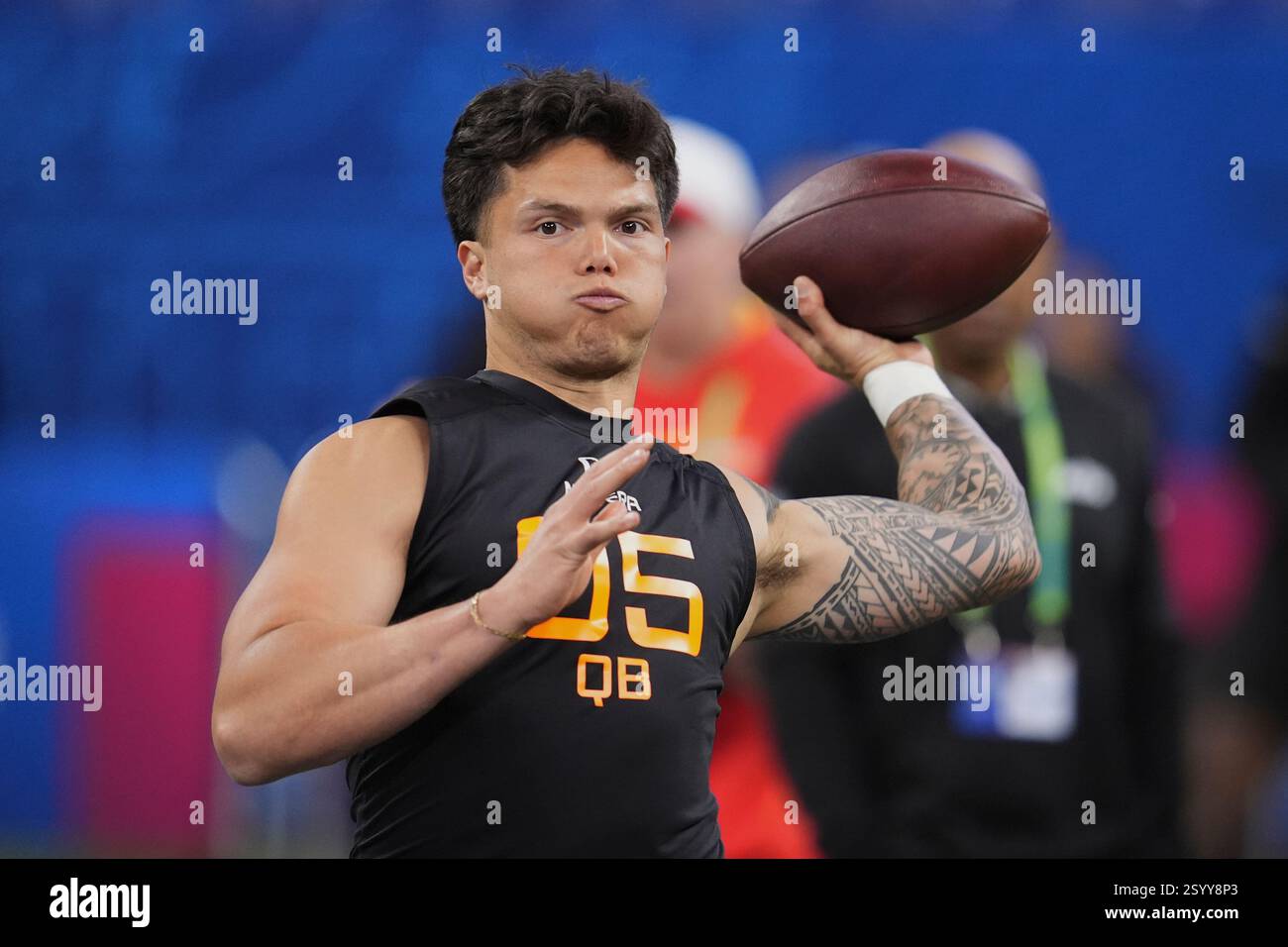 Oregon quarterback Dillon Gabriel warms up at the NFL football scouting ...