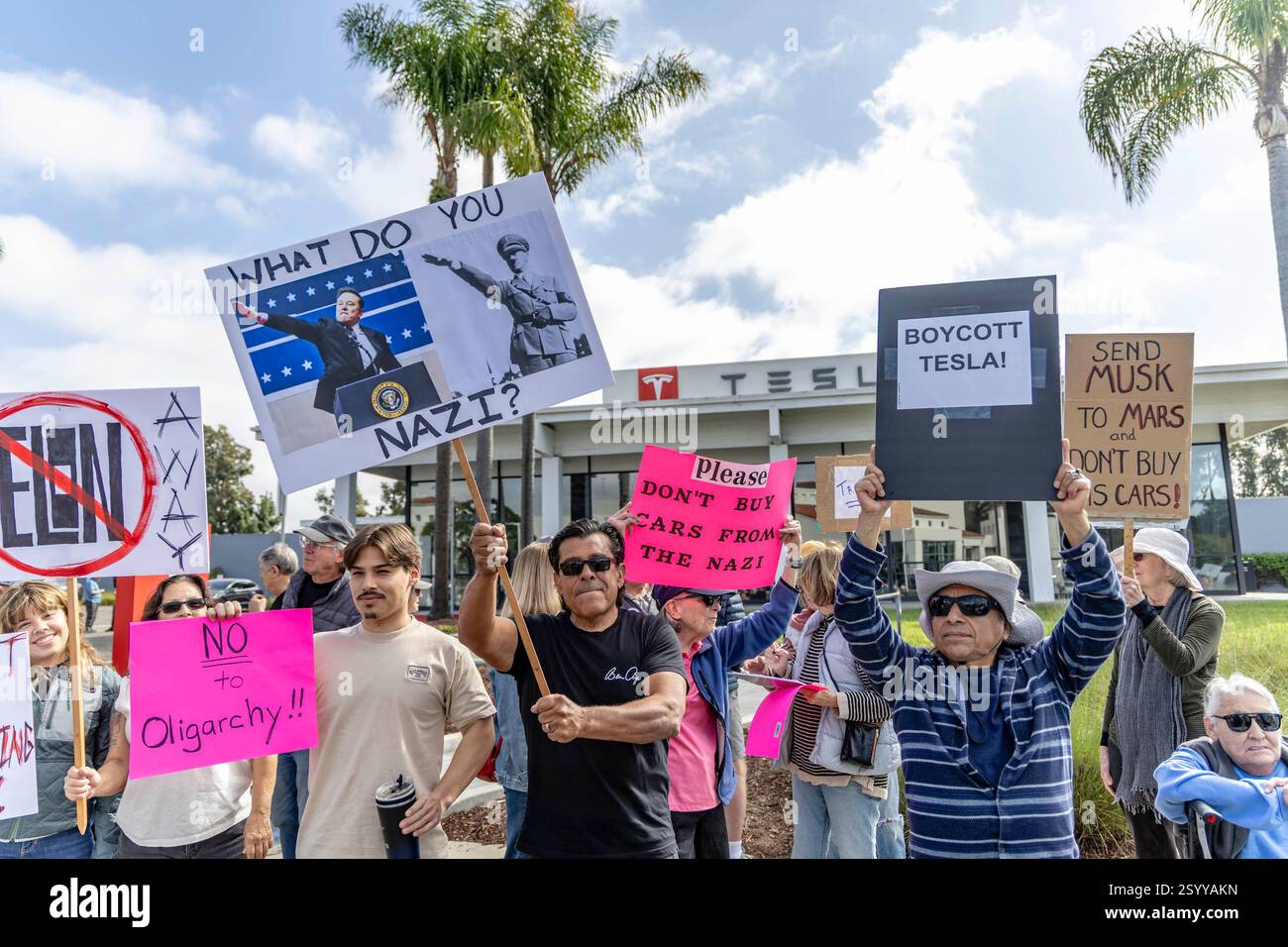 Santa Barbara protesters gather at the Tesla Dealership of Elon Musk in ...