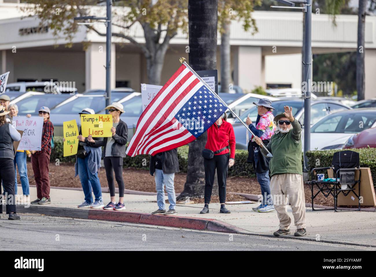 Santa Barbara protesters gather at the Tesla Dealership of Elon Musk in ...