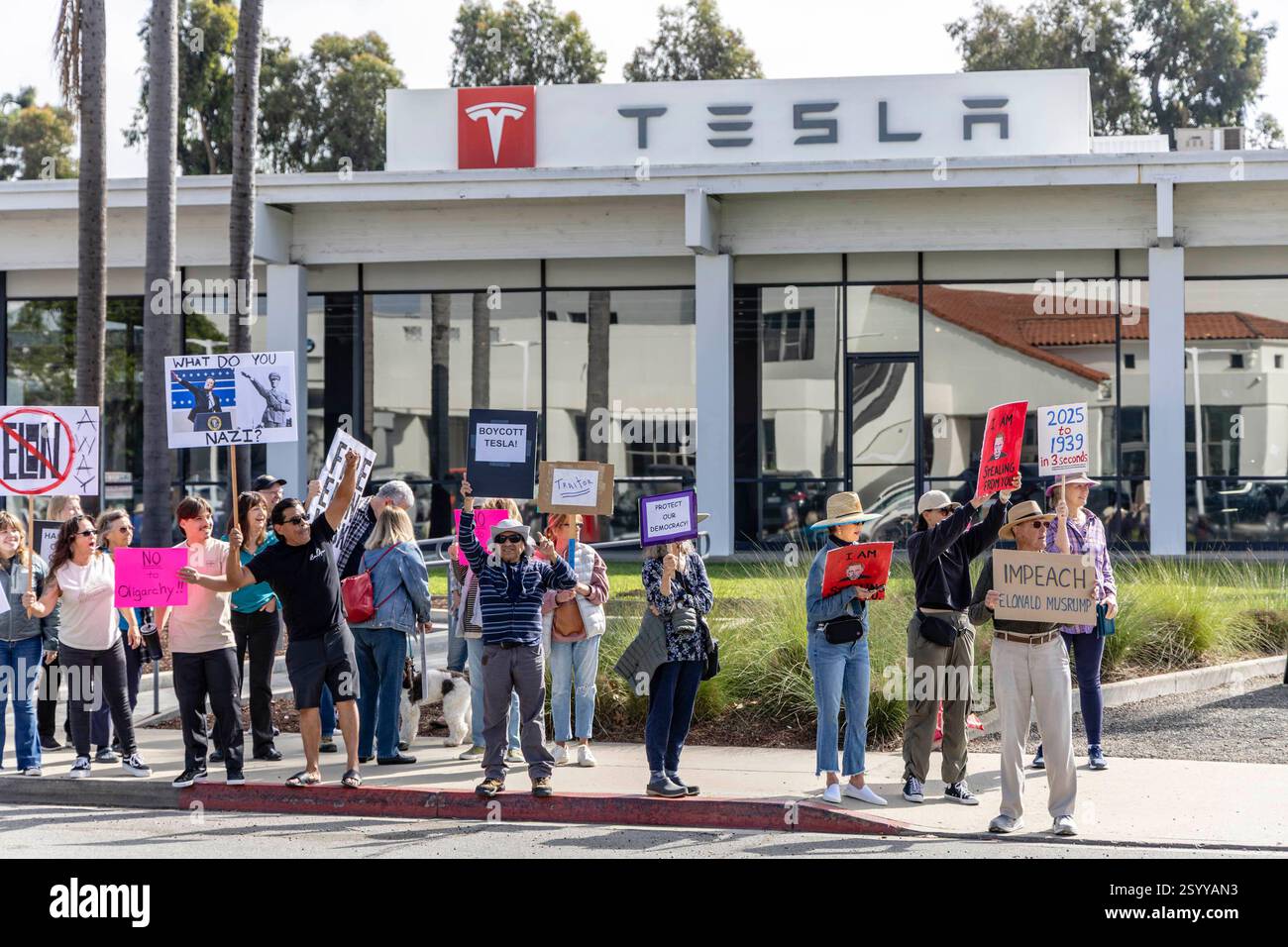 Santa Barbara protesters gather at the Tesla Dealership of Elon Musk in ...