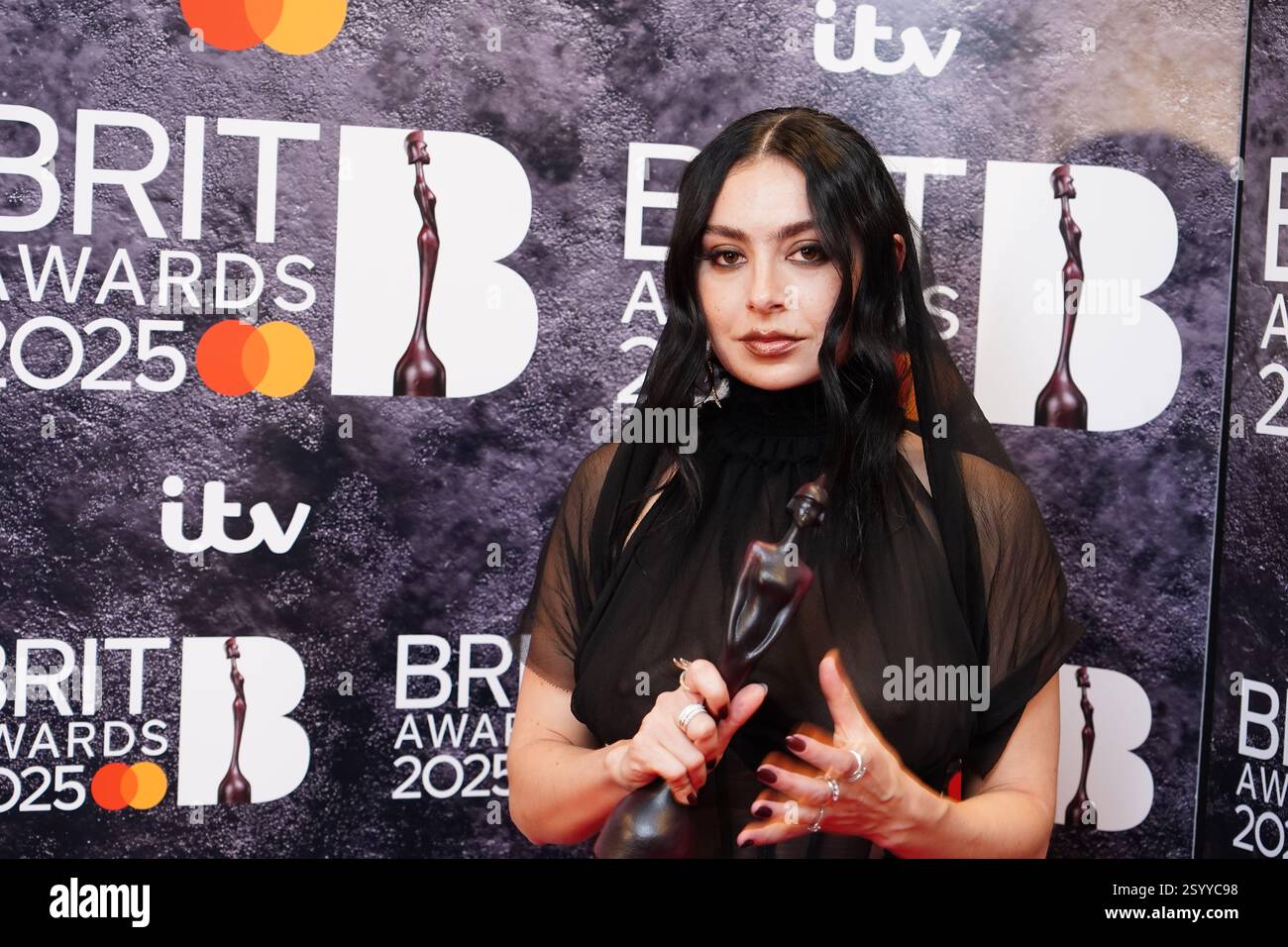 Charli XCX backstage at The BRIT Awards 2025 at London's O2 Arena after ...