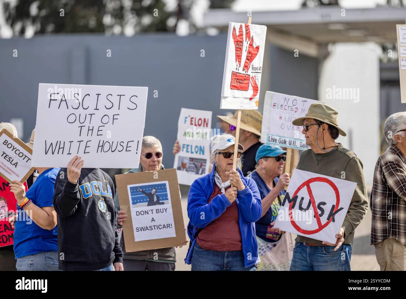 Santa Barbara protesters gather at the Tesla Dealership of Elon Musk in ...