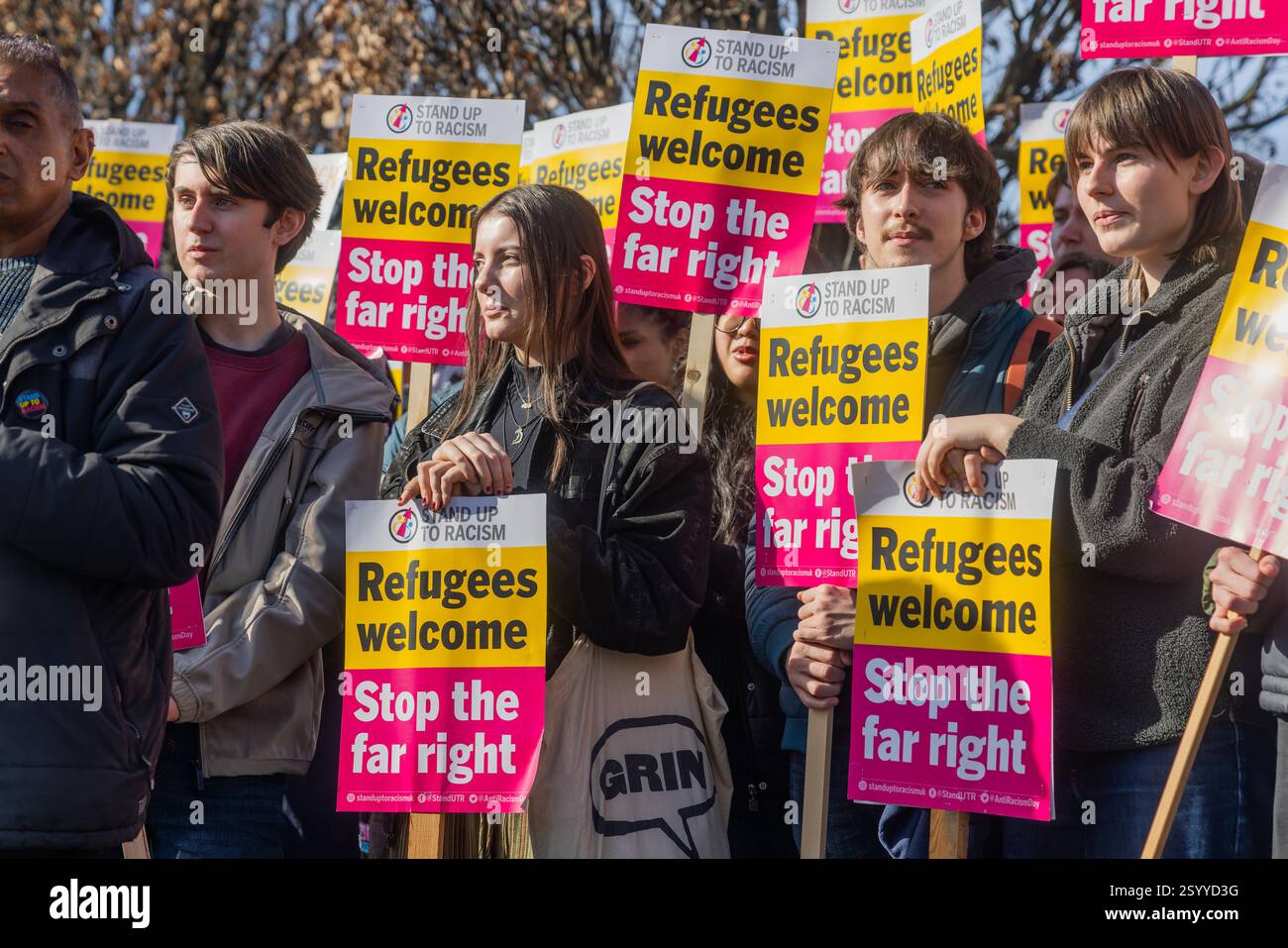 Nuneaton, UK. 01 MAR, 2025. Counter protestors hold Refugees Welcome ...
