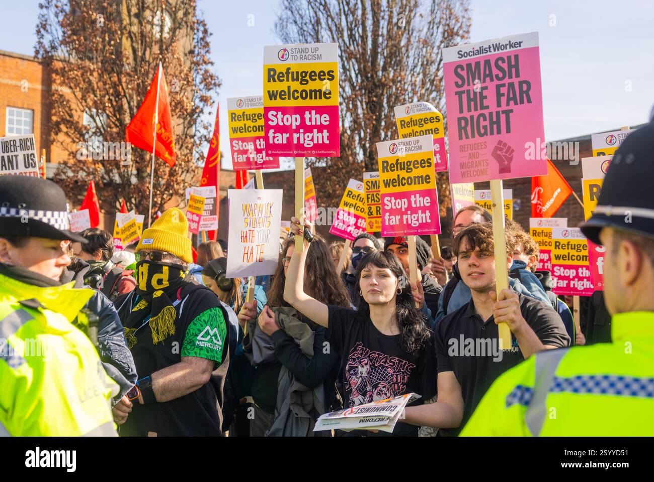 Nuneaton, UK. 01 MAR, 2025. Counter protestors hold signs as Britain ...