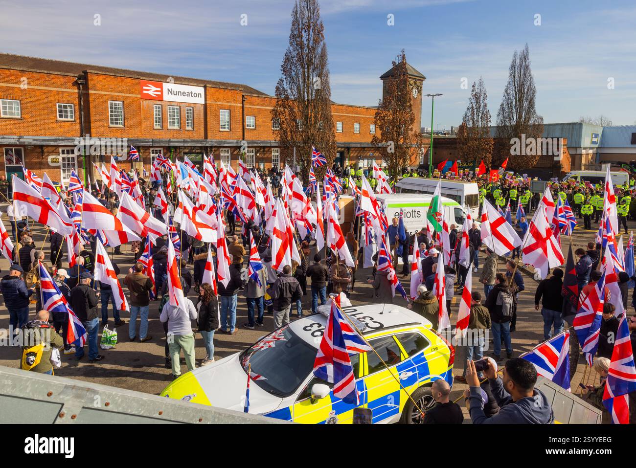Nuneaton, UK. 01 MAR, 2025. Protestors gather with flags at Nuneation ...