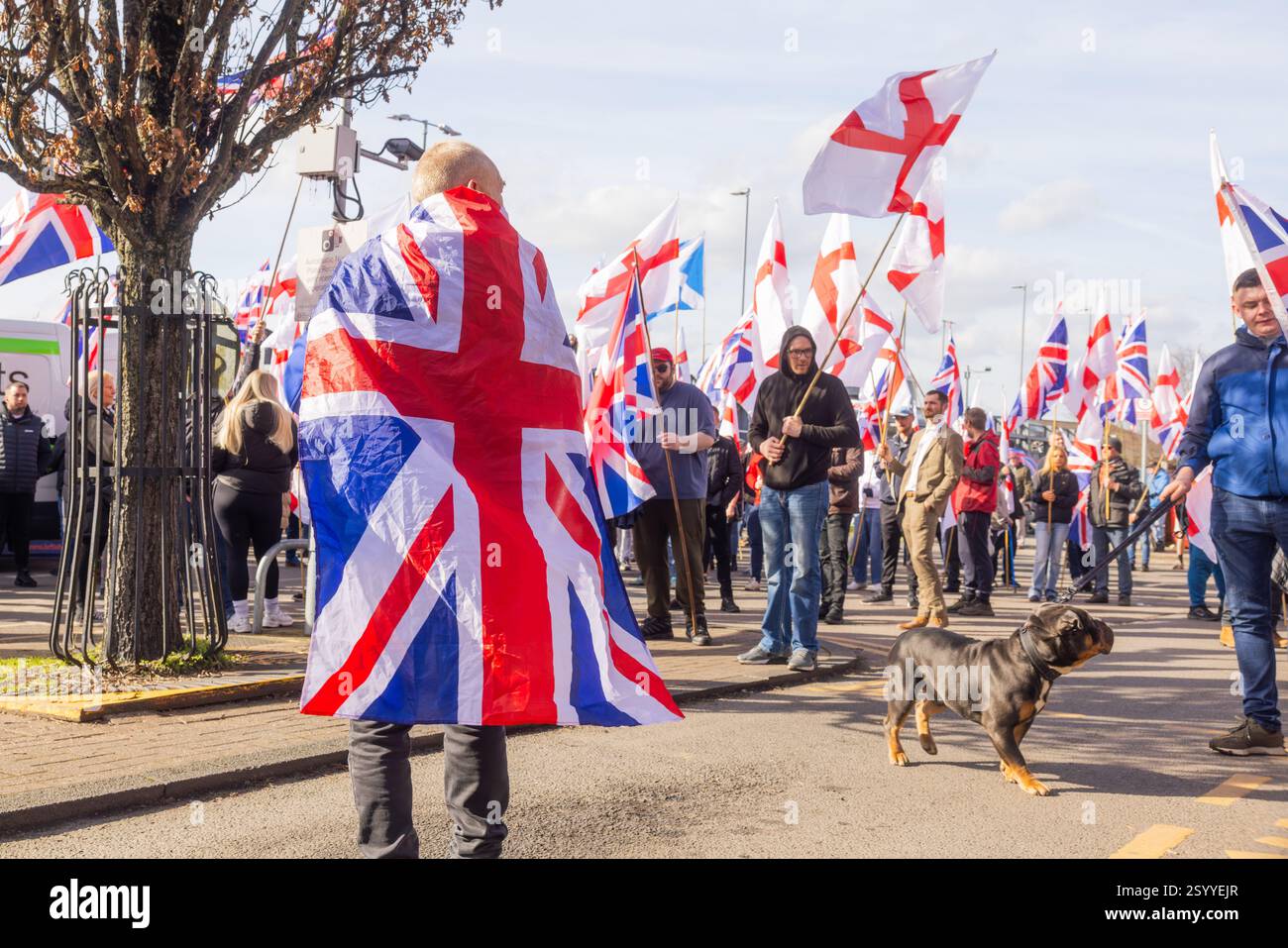 Nuneaton, UK. 01 MAR, 2025. Protestors gather with flags at Nuneation ...