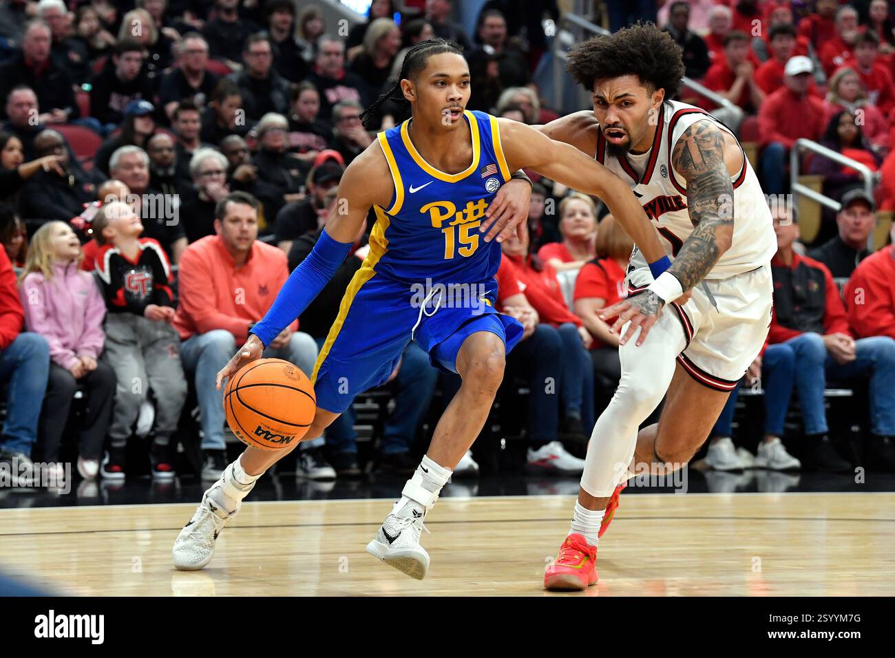 Pittsburgh guard Jaland Lowe (15) drives against Louisville guard J ...