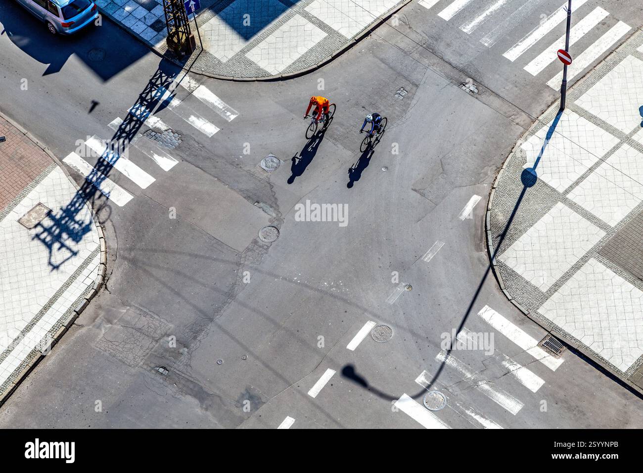 aerial of bicycle driver at a crossing riding side by side Stock Photo ...