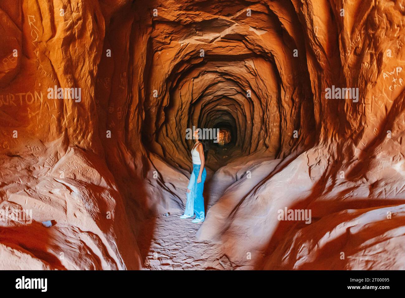 Young hiker woman on popular trail Belly of the Dragon Tunnel Cave in ...