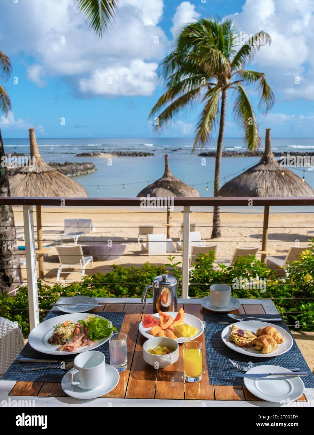 Breakfast at a tropical beach in Mauritius Stock Photo - Alamy