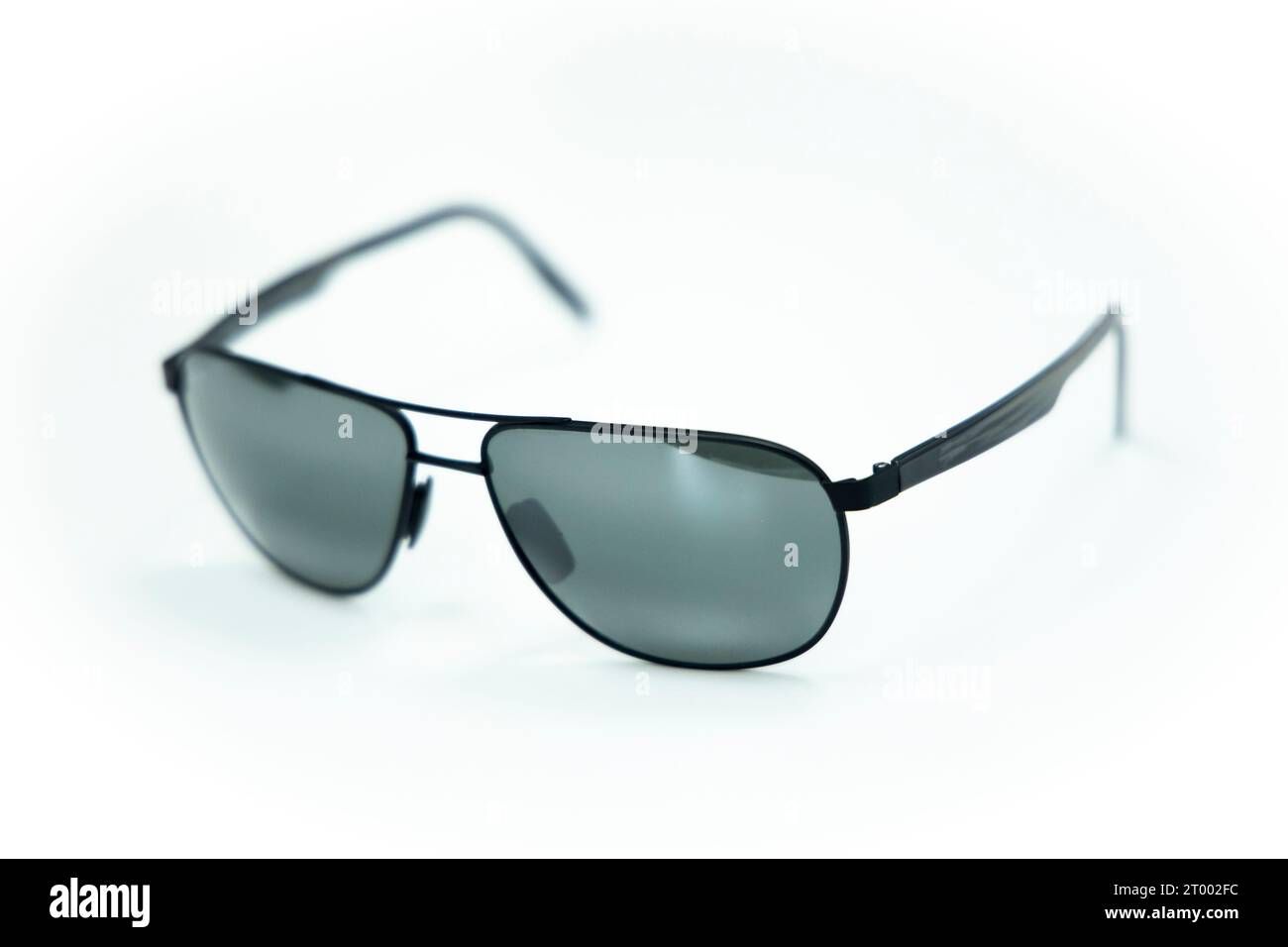 Table top view of a sunglass with white background Stock Photo - Alamy