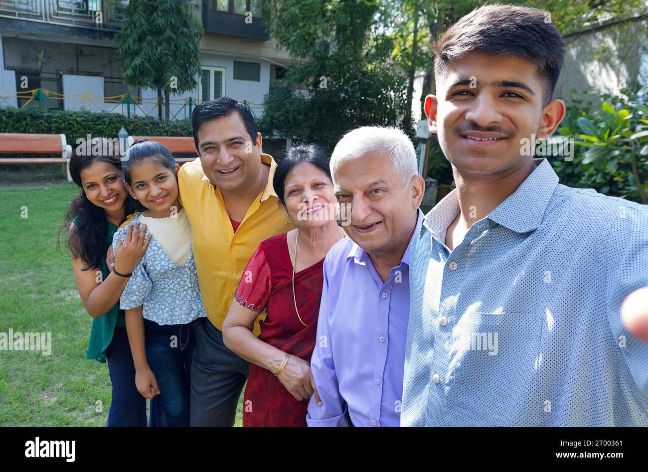 Multi generation happy Indian family taking selfie in backyard Stock ...