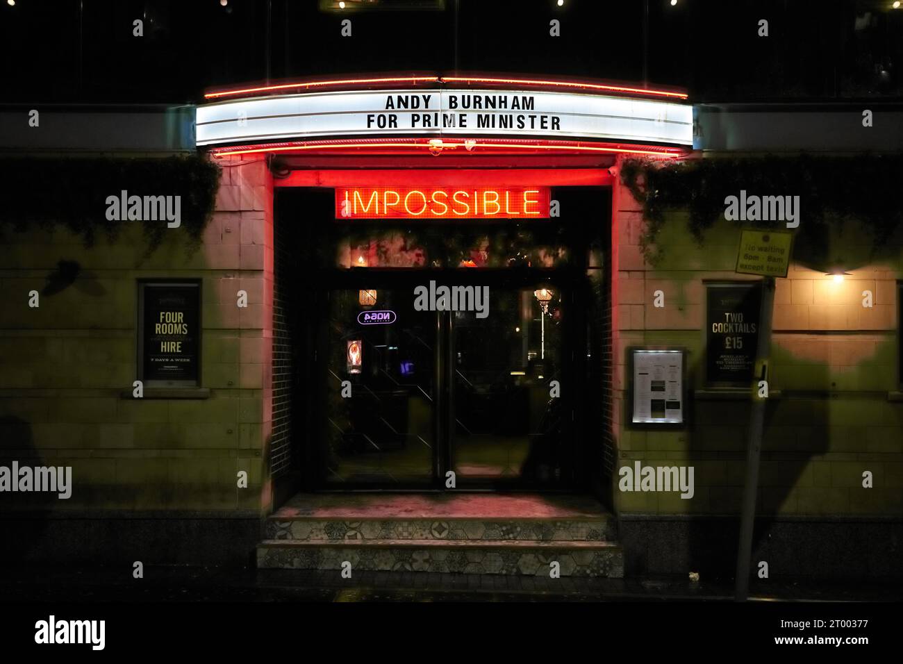 Andy Burnham for Prime Minister displayed over a bar door, Impossible ...