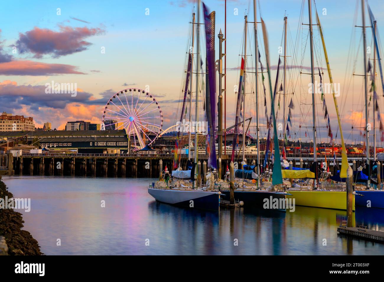 Seattle downtown waterfront buildings, the Great Wheel, and sail boats ...