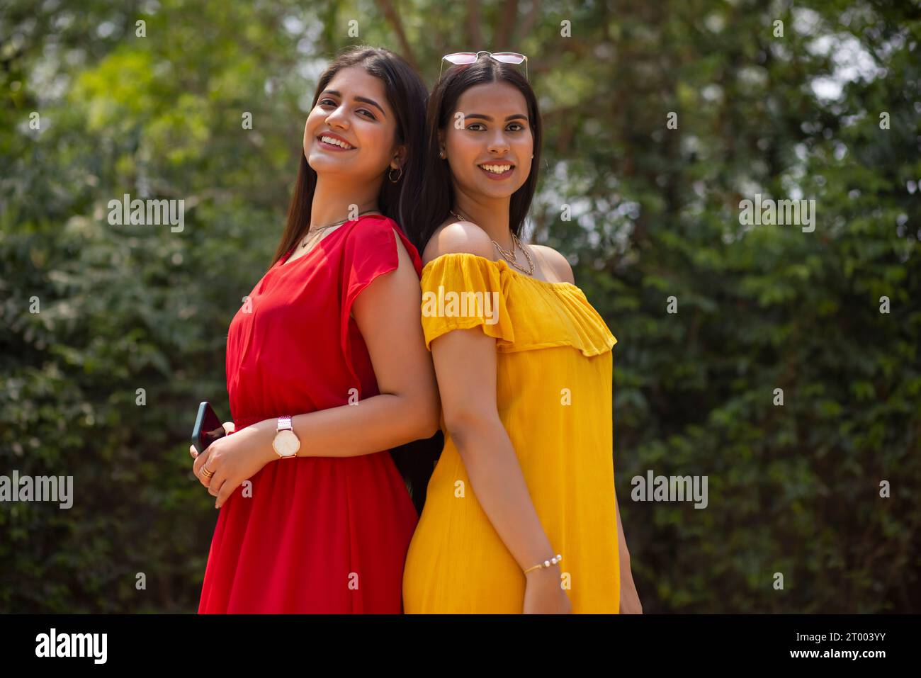 Back view friend holding hi-res stock photography and images - Alamy