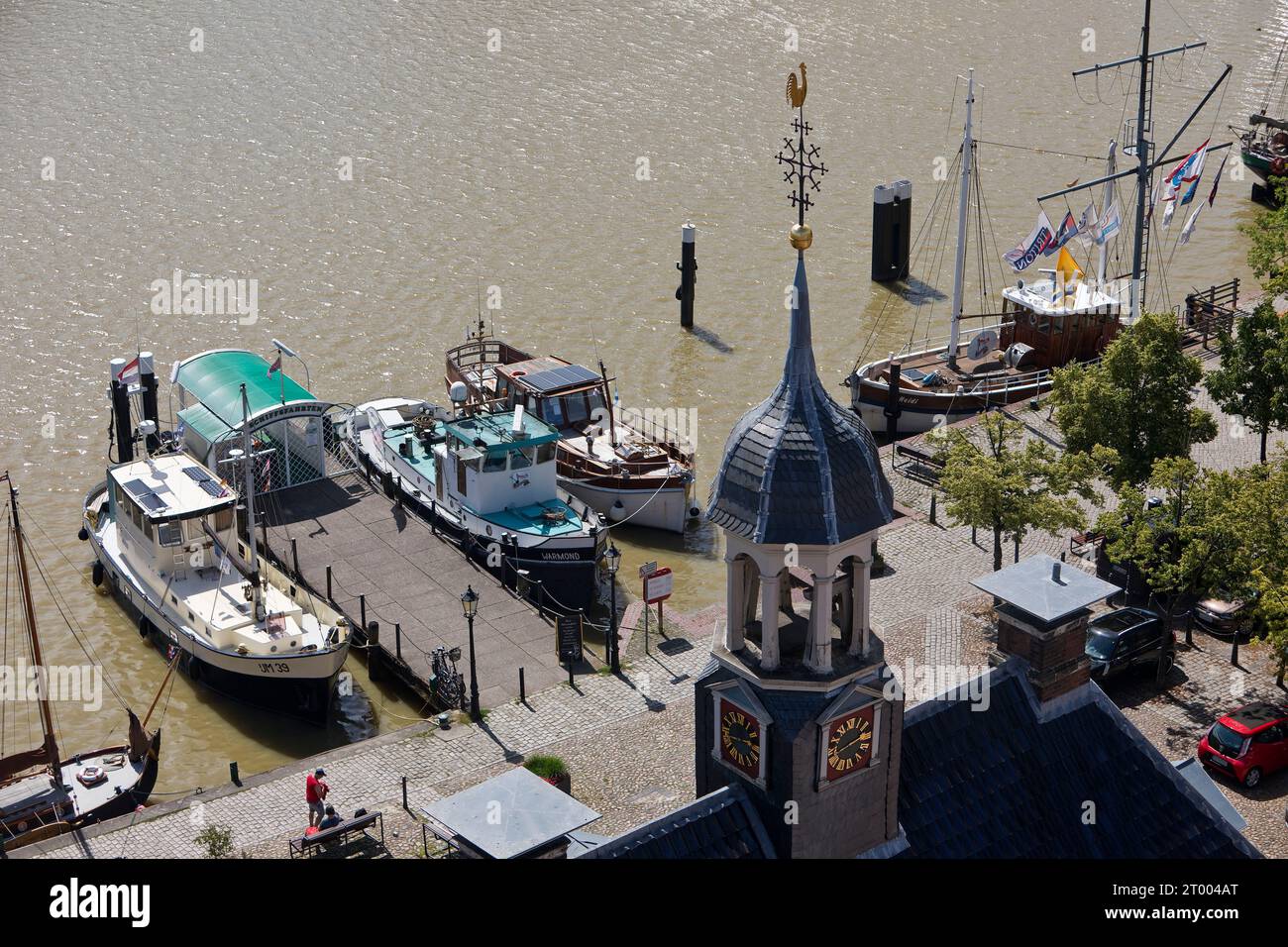 Ships in the museum harbor with the tower of the old scale, Leer,East ...
