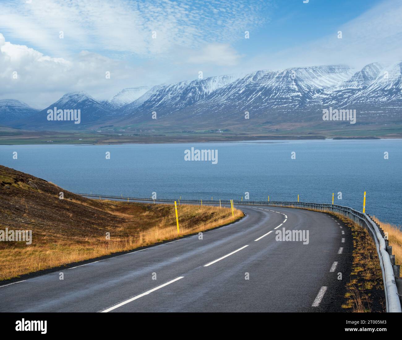 Highway road and mountain view during auto trip in Iceland. Spectacular Icelandic landscape with ...