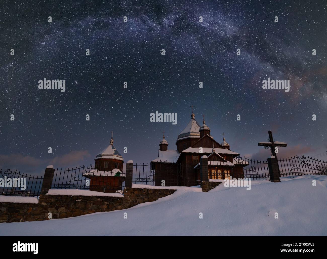 Night sky mith milkyway srars above countryside remote village church ...