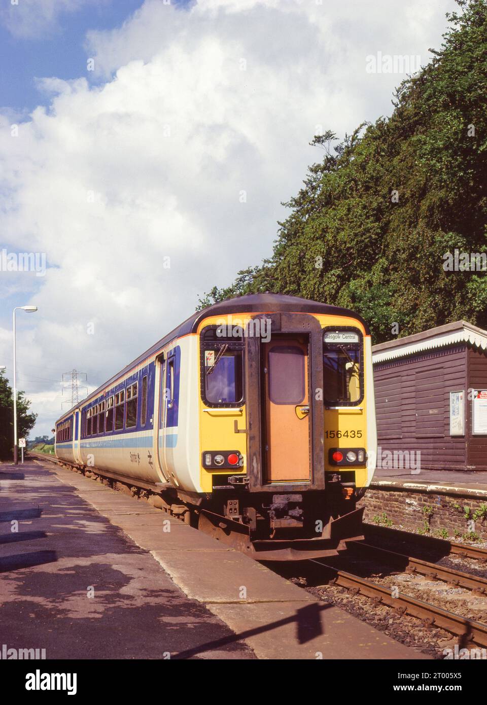 Passenger train at a rural station Stock Photo - Alamy