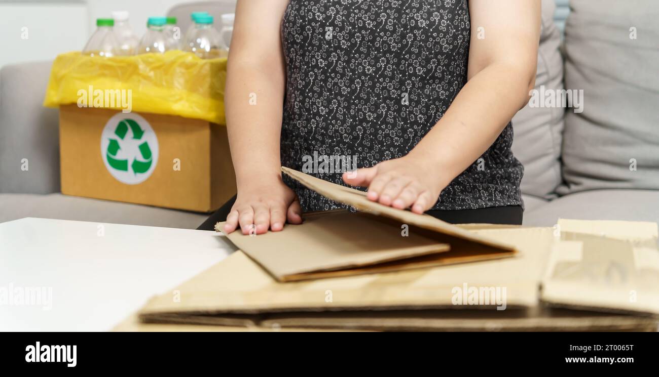 Home recycle eco zero waste concept Woman using recycle paper box ...