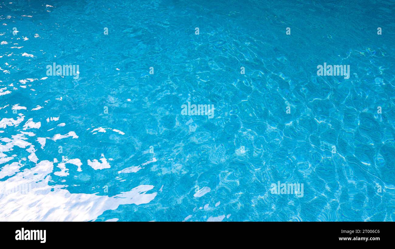 Abstract pool water. Swimming pool bottom caustics ripple and flow with ...