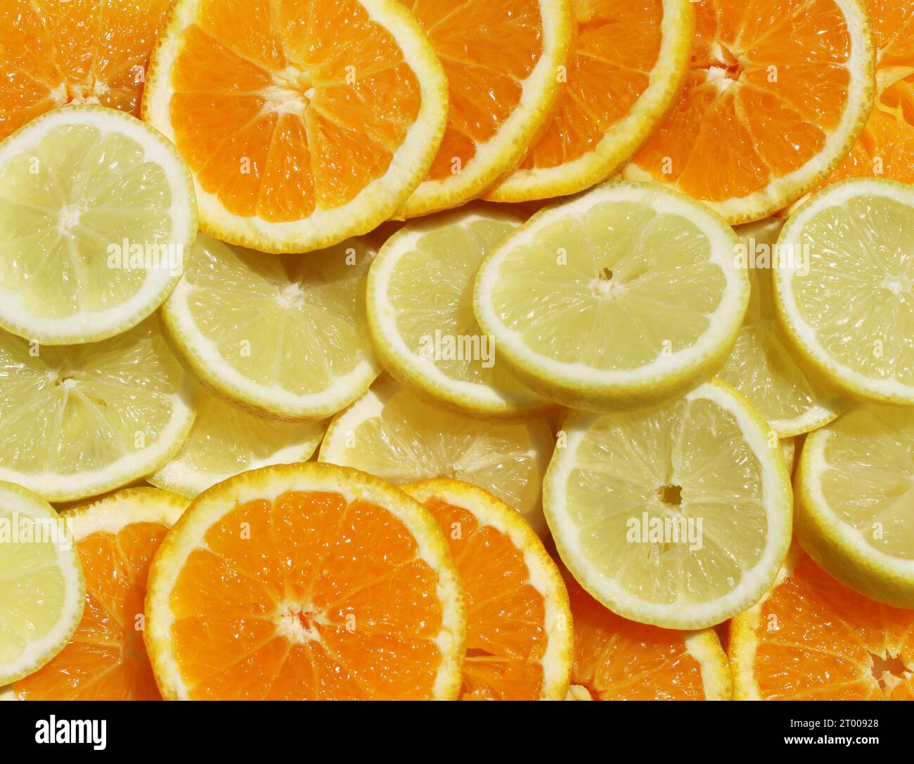 sunny lemon slice in front of the shining sun and the bright blue sky ...