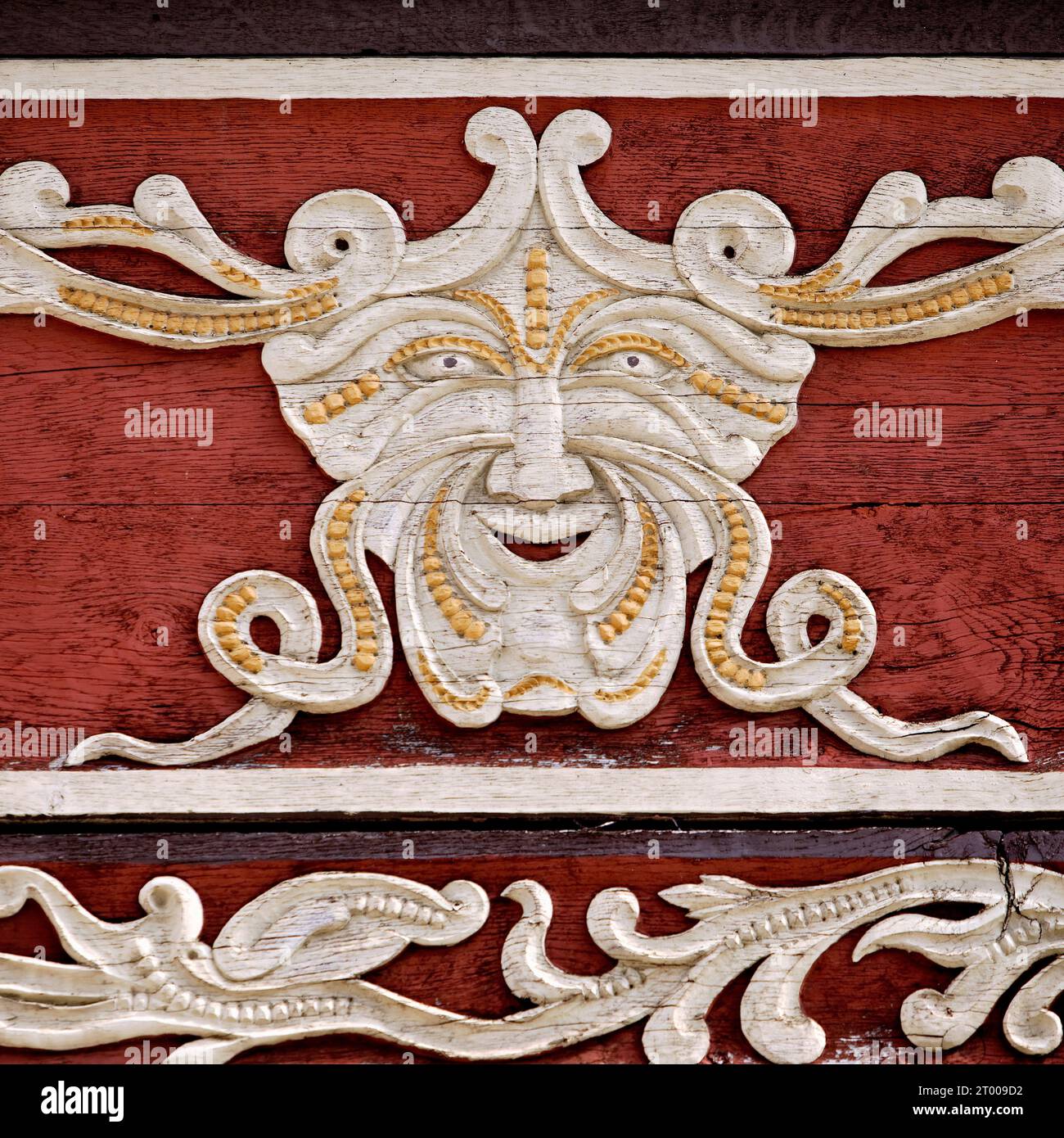 Detail on a house facade, comedy theater mask as a wood carving, Hameln ...