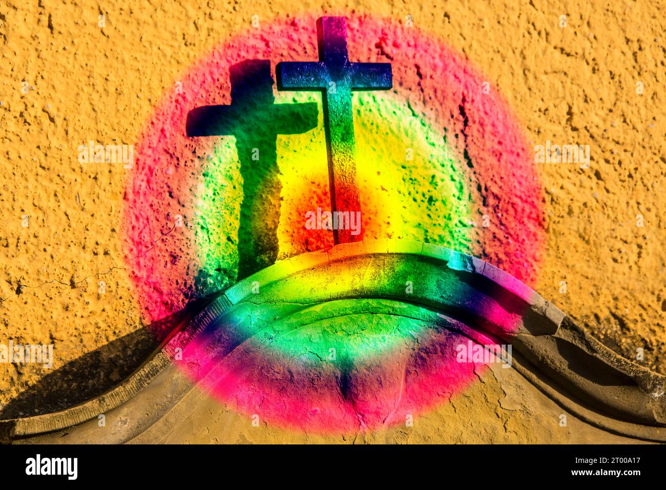 Christian cross on a tombstone in a LGBTQ color circle Stock Photo - Alamy