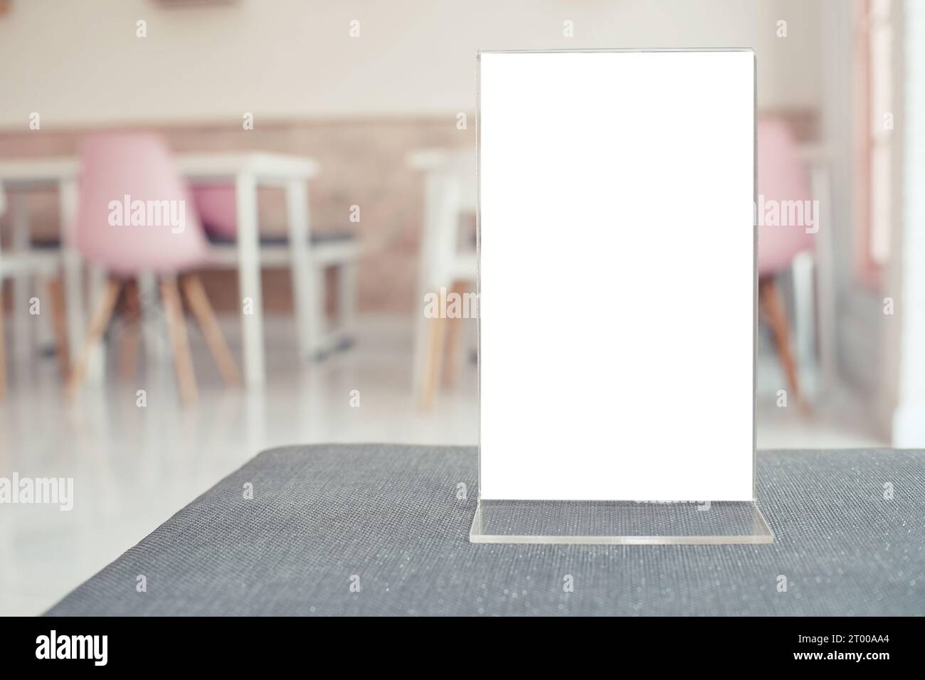 Menu frame standing on wood table in Bar restaurant cafe. space for ...