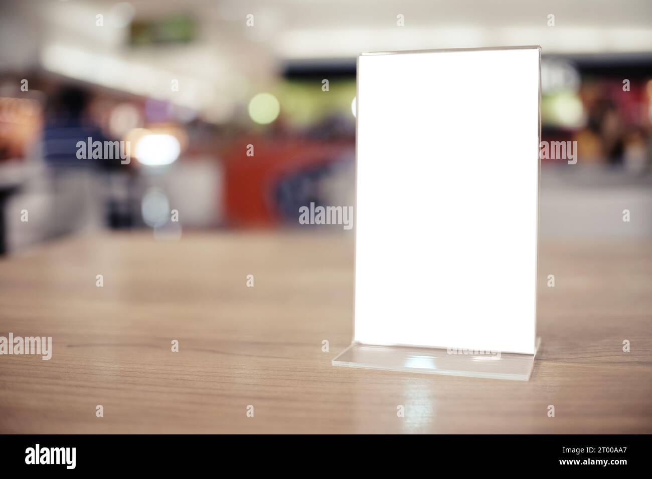 Menu frame standing on wood table in Bar restaurant cafe. space for ...