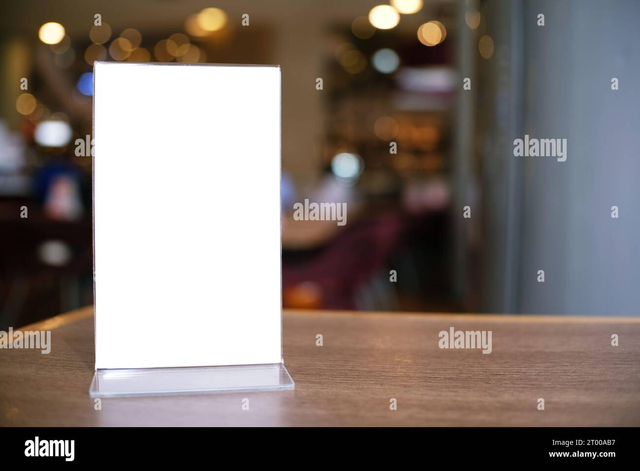 Menu frame standing on wood table in Bar restaurant cafe. space for ...