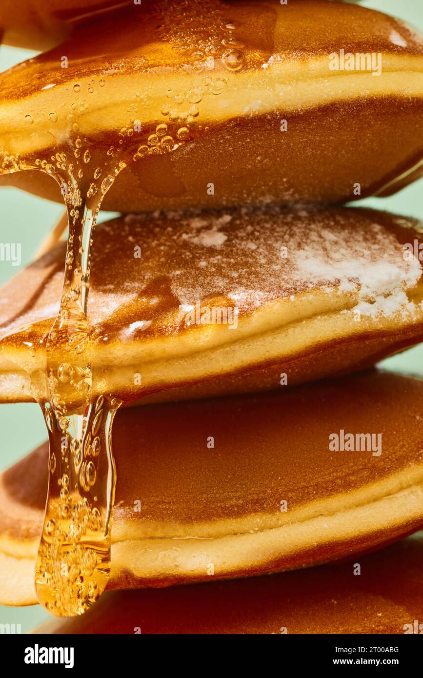 Food pop art photography. Close up. Syrup dripping on sweet delicious ...
