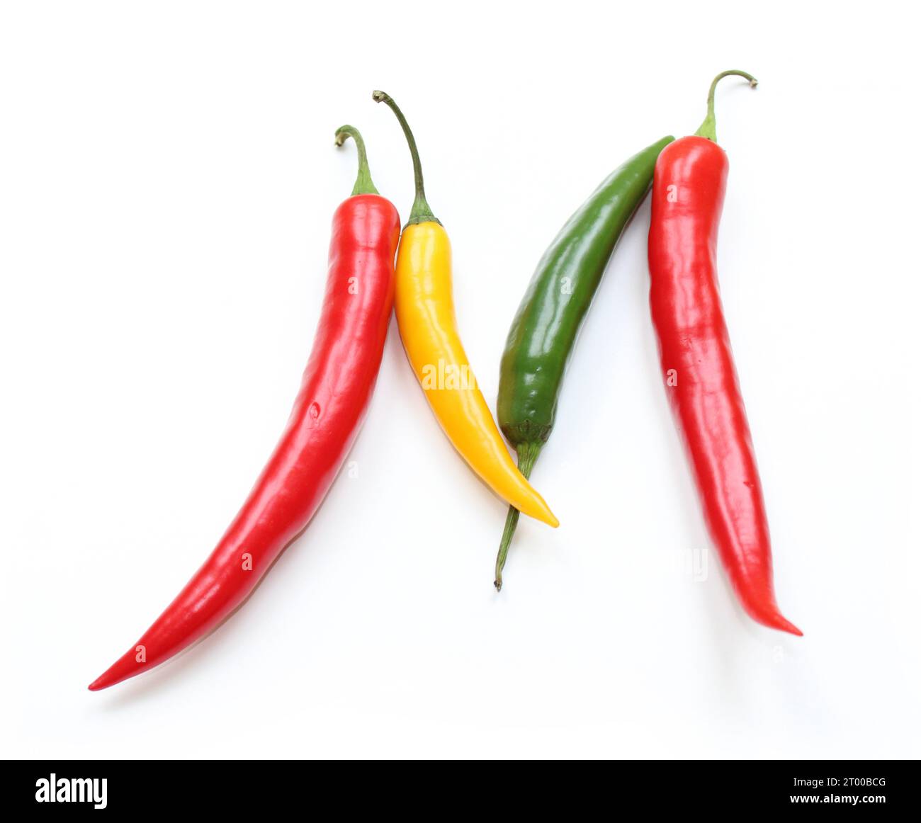 letter M made from red green purple yellow chili peppers, alphabetic ...