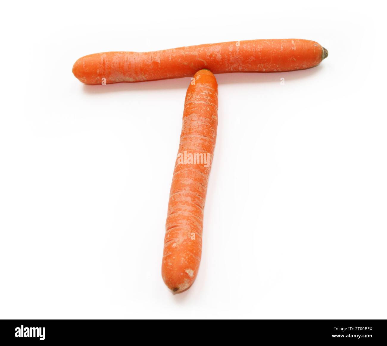 letter T made from red green purple yellow chili peppers, alphabetic ...