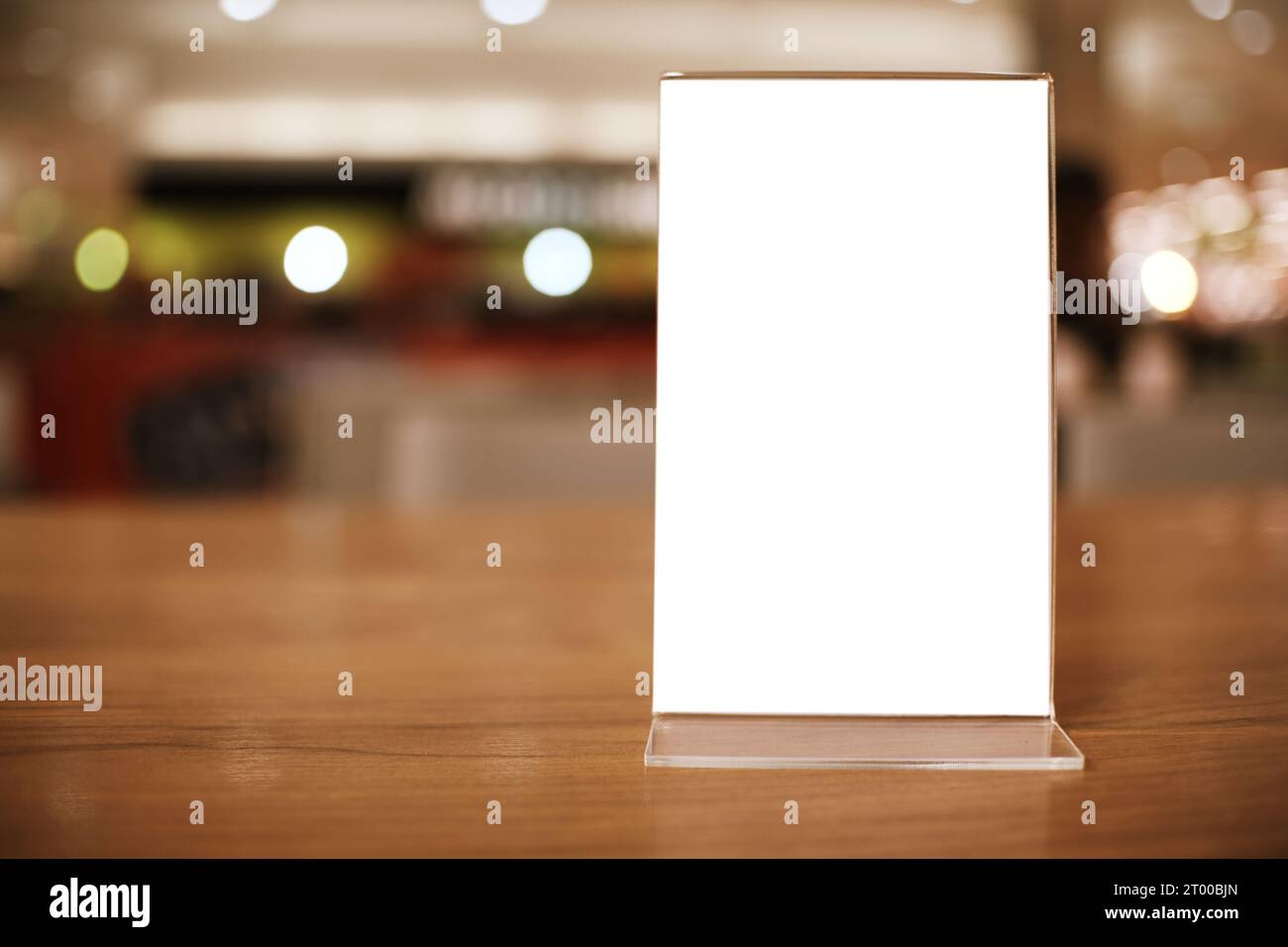 Menu frame standing on wood table in Bar restaurant cafe. space for ...