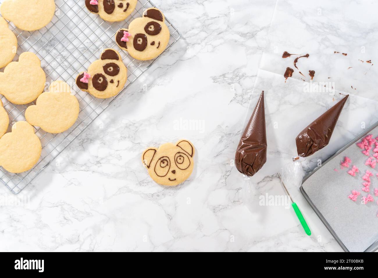 Panda shaped shortbread cookies with chocolate icing Stock Photo - Alamy