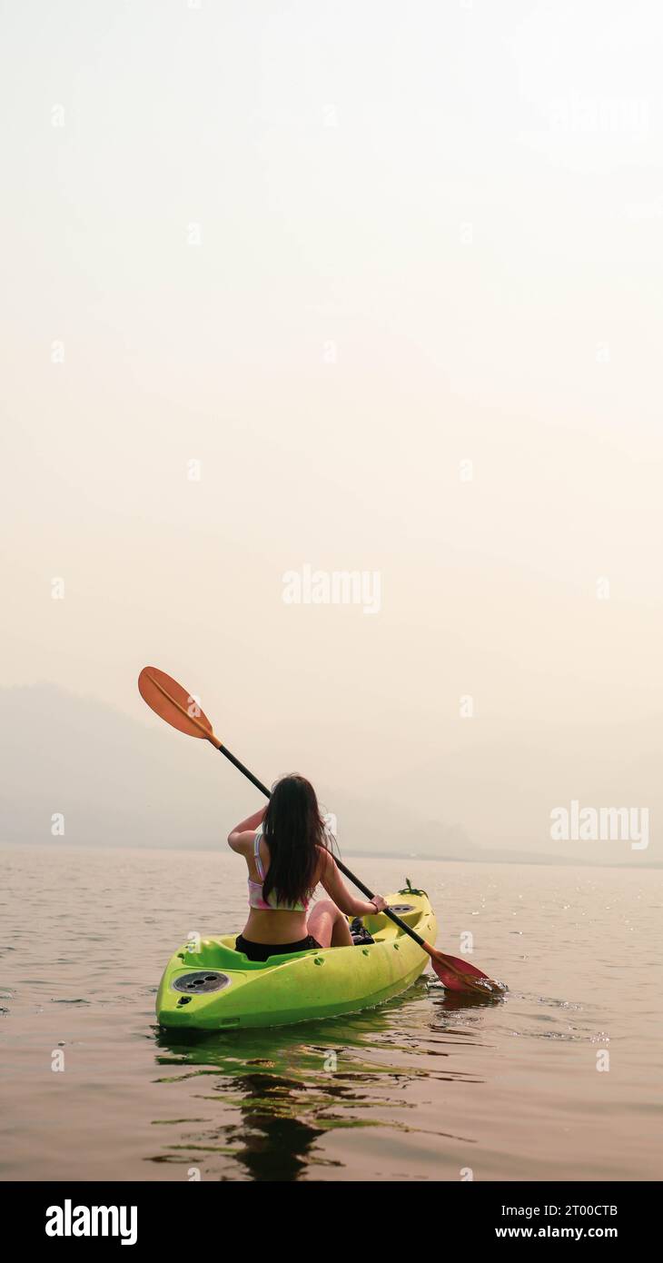 Kayak Water Sports at Lake. Kayakers enjoying the beautiful sunrise ...
