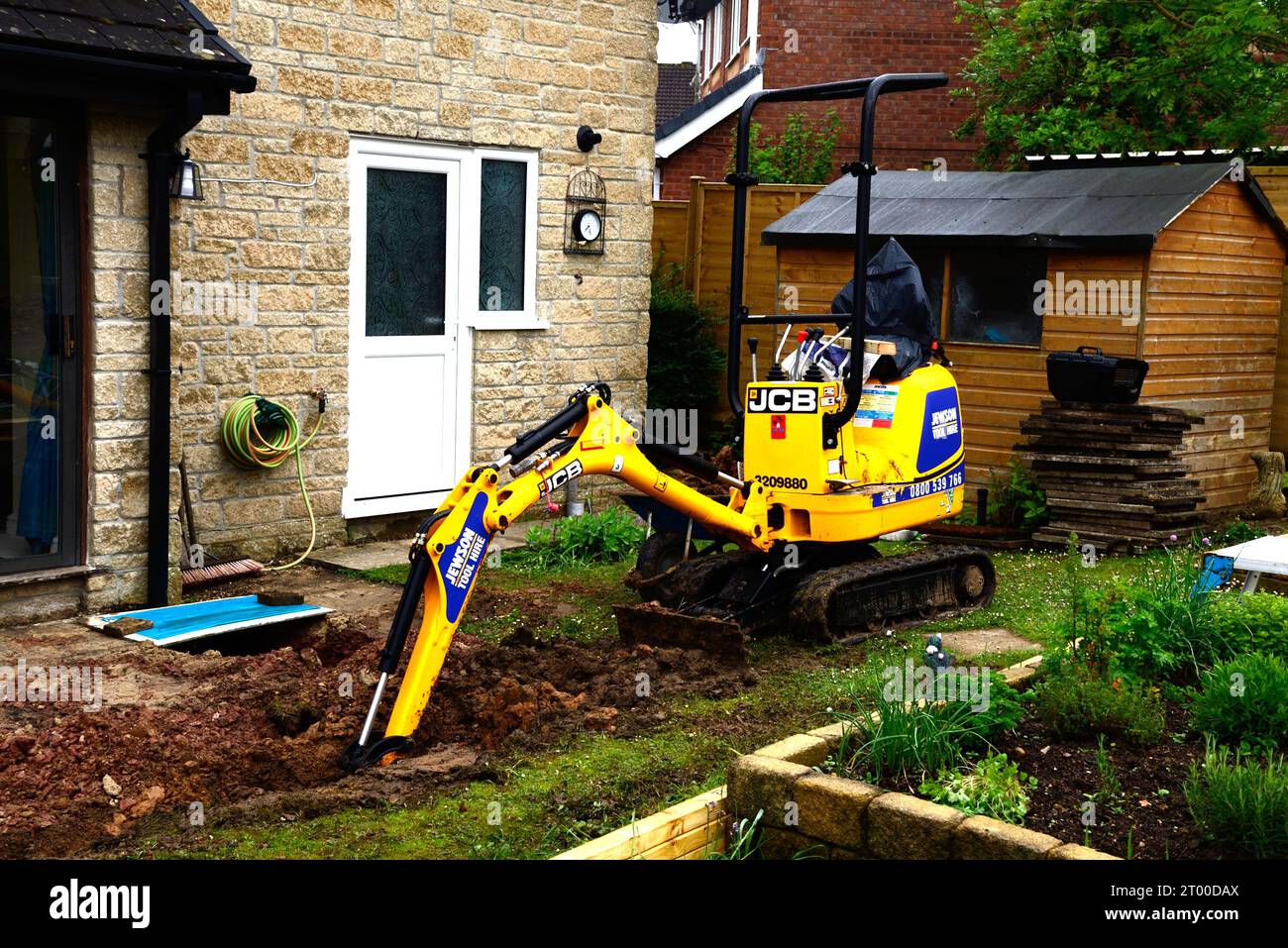 Mini wheelbarrow hi-res stock photography and images - Alamy