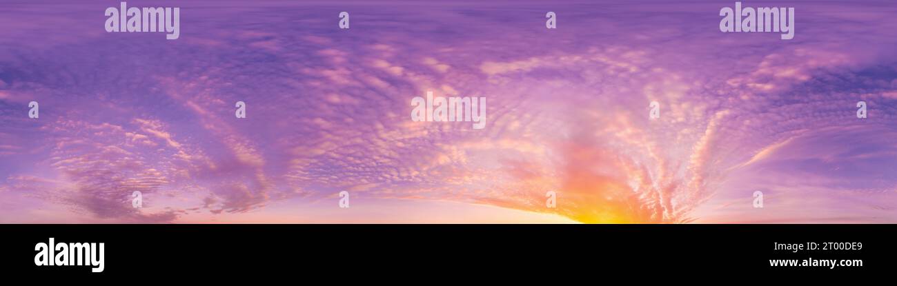 Sunset sky panorama with dramatic bright glowing pink Cirrus clouds ...