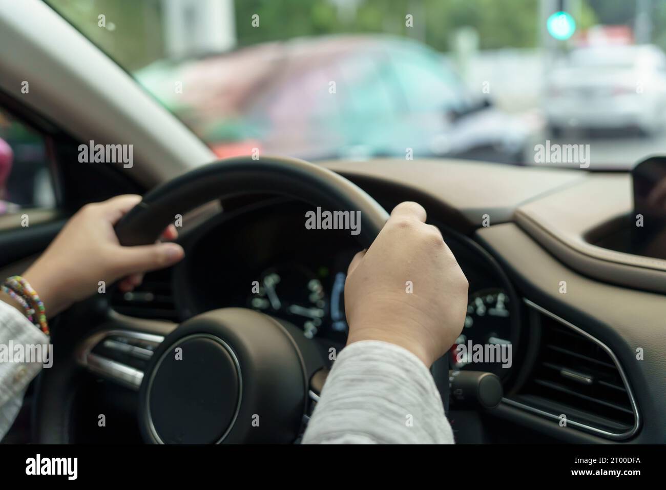 Woman driving car. girl feeling happy to drive holding steering wheel ...