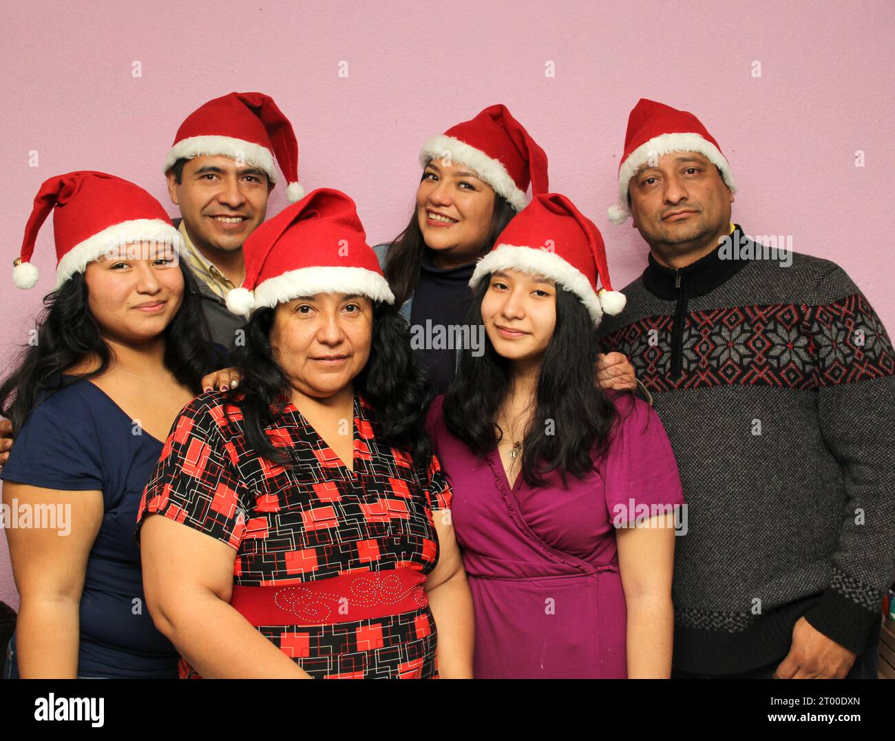 Portrait of a real Mexican Latino family with diverse bodies with ...