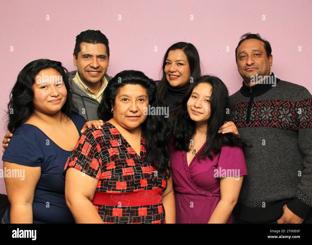 Portrait of a real Mexican Latino family with diverse bodies with ...