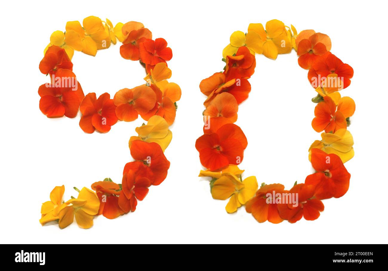 number made from freshly picked yellow, orange, red, flowers. isolated ...