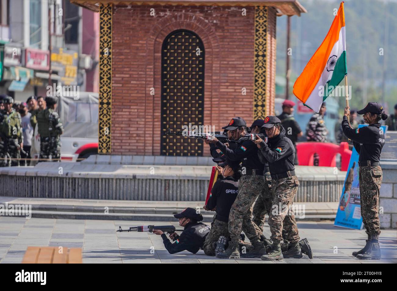Central Reserve Police Force (CRPF) commandoes perform before the start of a bike rally to ...