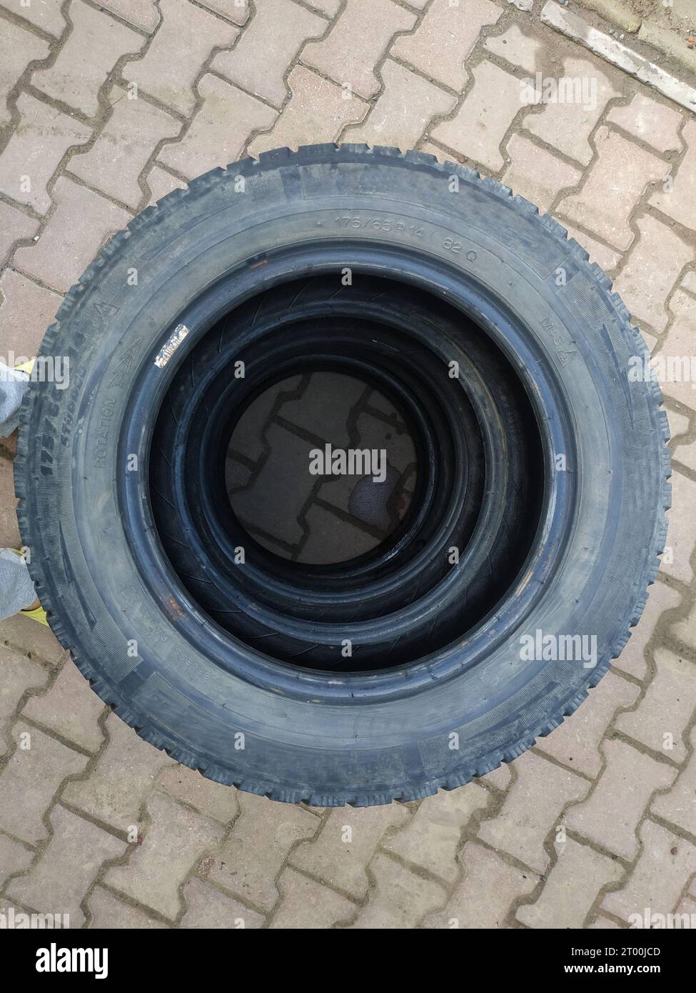 Old worn car tires. Damaged rubber. Old tyres. Recycling of rubber ...