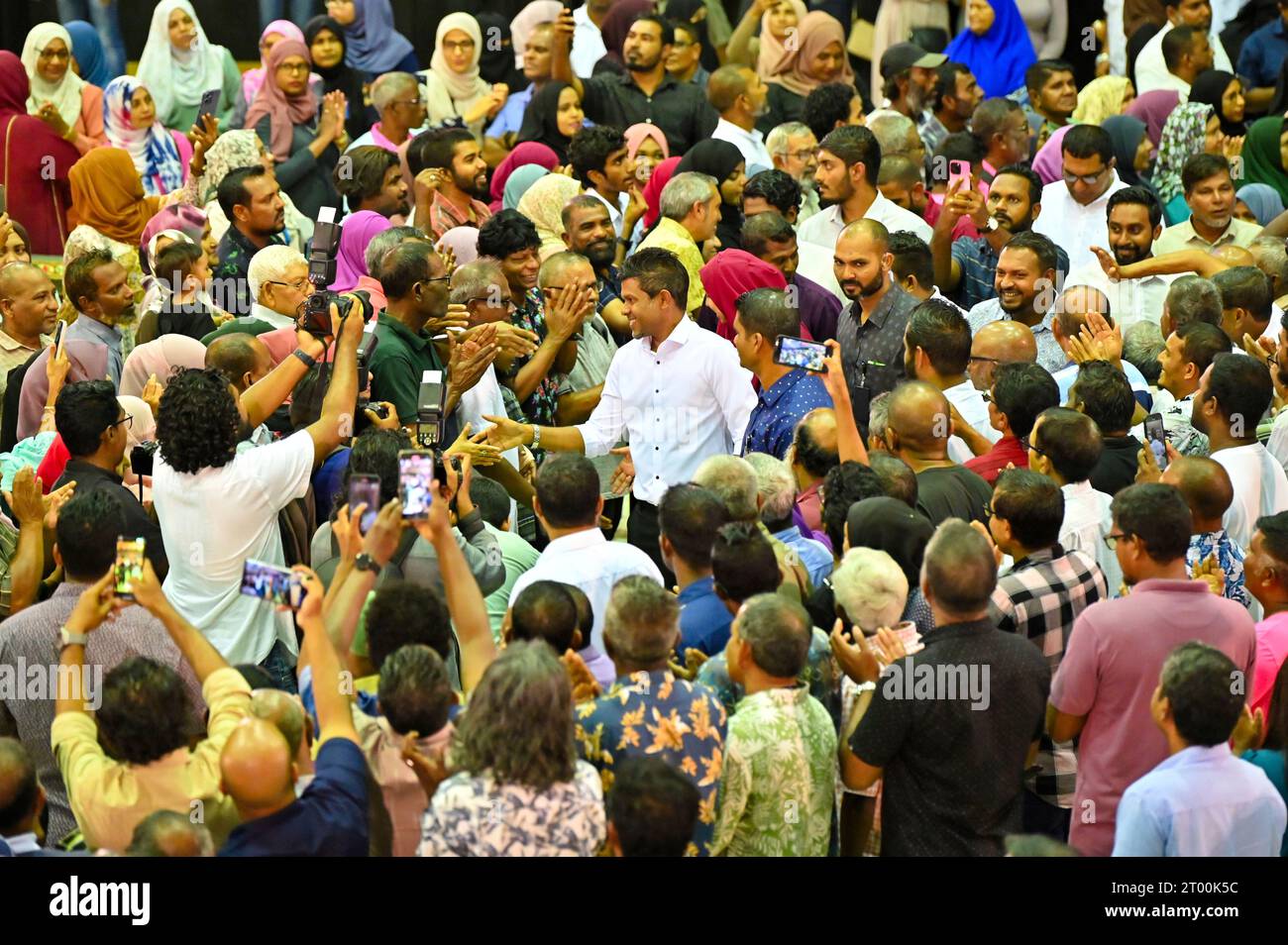 Maldives' Vice President-elect Hussain Mohamed Latheef, center, attends ...