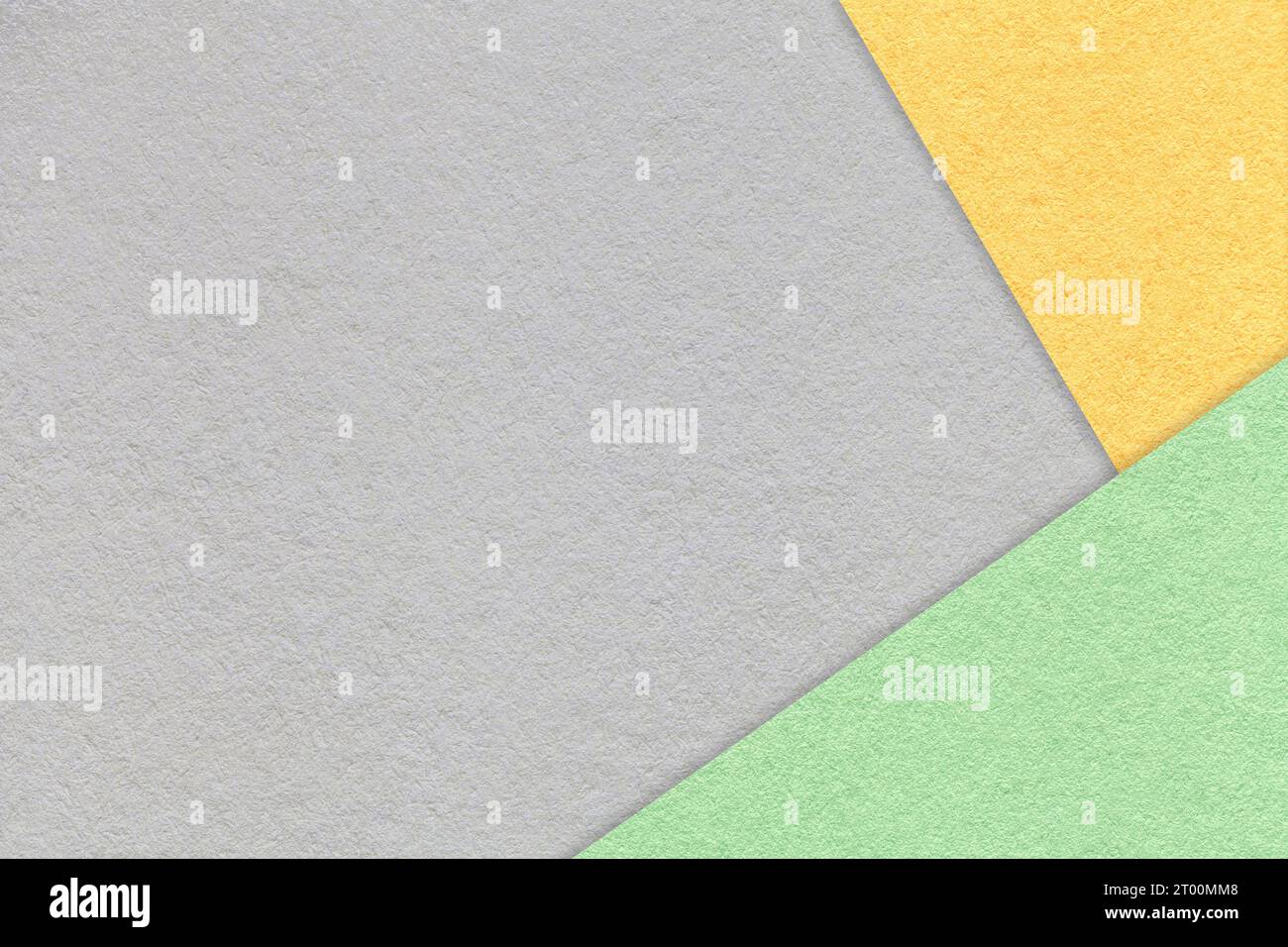 Texture of craft light gray color paper background with yellow and ...