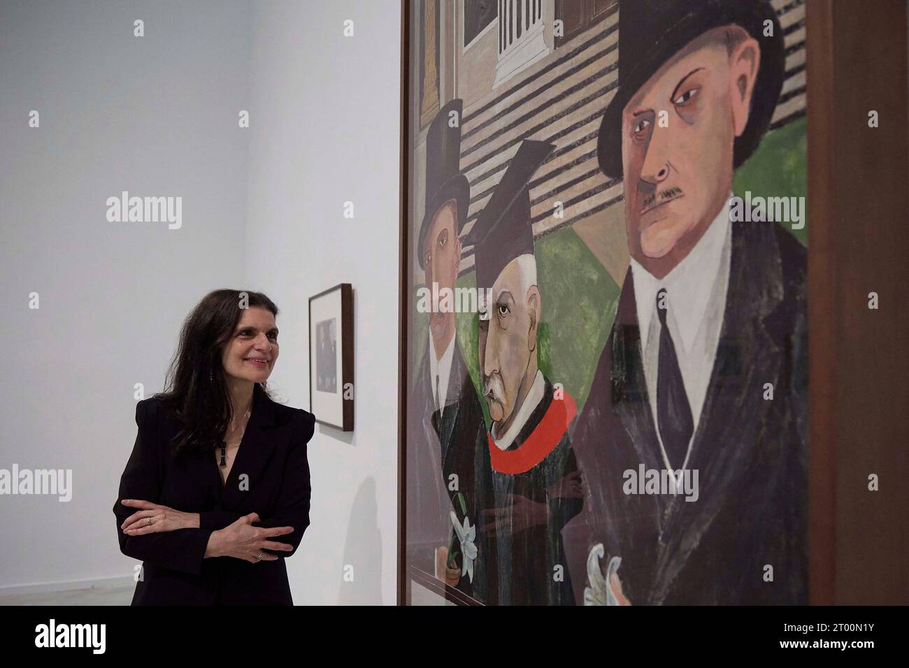 Curator Laura Katzman looks at one of the works at the presentation of ...